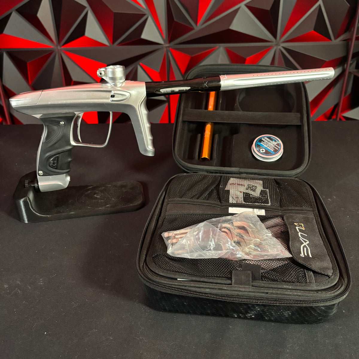 Used DLX TM40 Paintball Gun - Dust Silver w/Black Freak XL Back