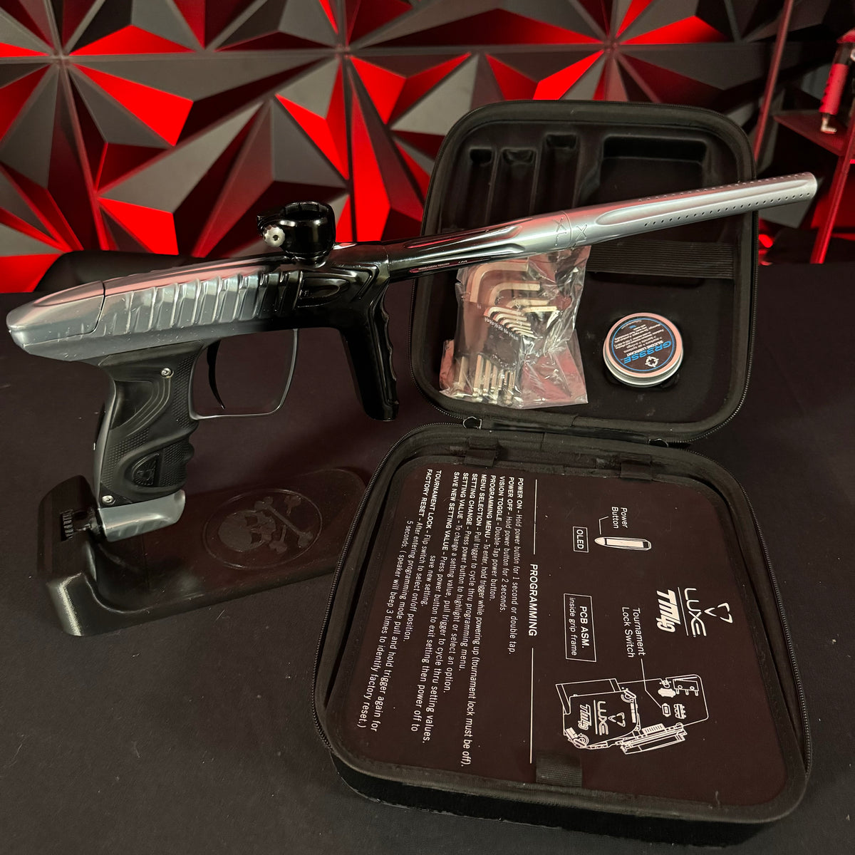 Used DLX Project TM40 Paintball Gun - Polished Silver/Black Fade