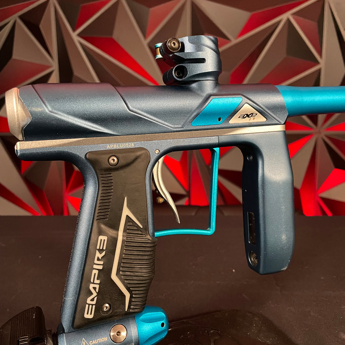 Used Empire Axe Pro Paintball Gun - Blue/Silver w/ Redline Board