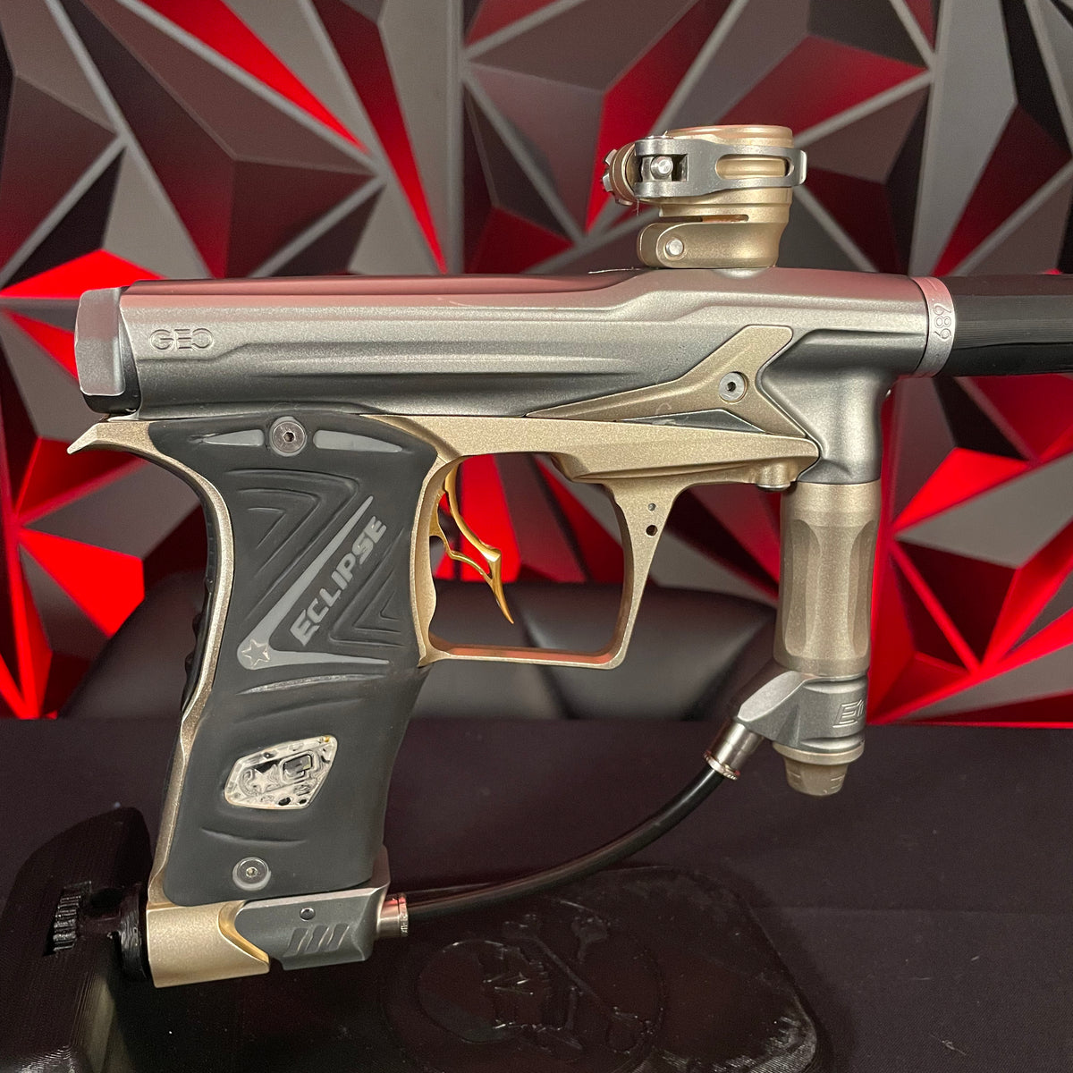 Used Planet Eclipse Geo 3 Paintball Gun - Grey/Gold w/ Black Pro DNA B