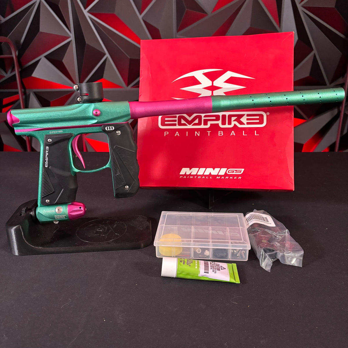 Used Empire Mini GS Paintball Gun- Teal/ Hot pink
