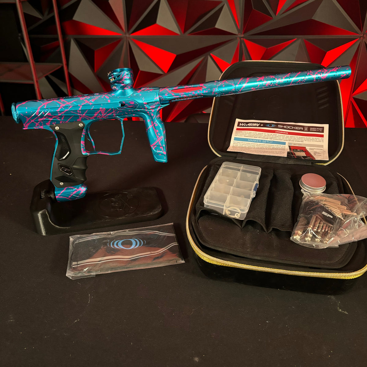 Used HK Army Shocker Paintball Gun - Blue/Pink Splash