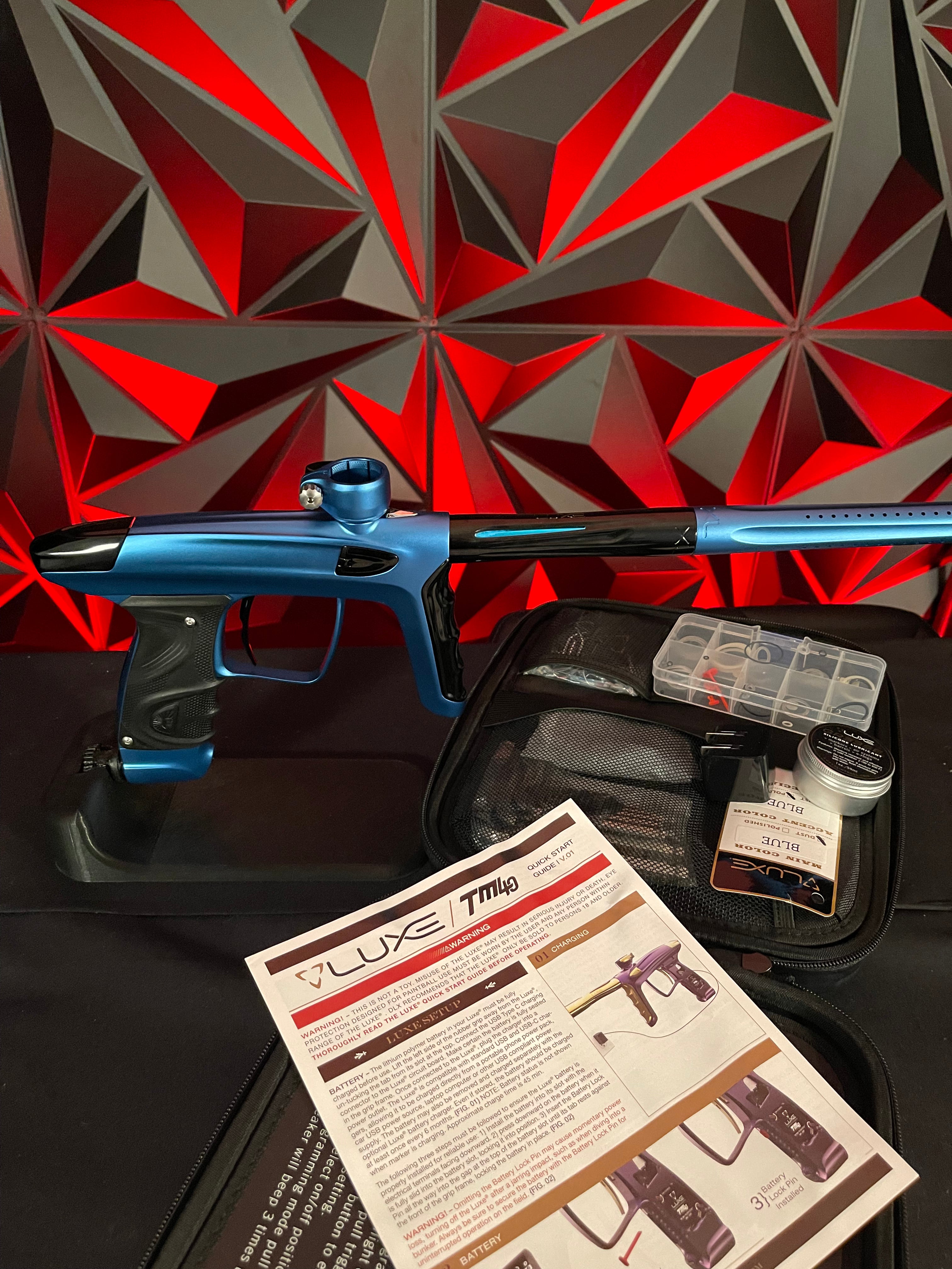 Used DLX Luxe TM40 Paintball Gun - Dust Blue / Polished Black – Punishers Paintball