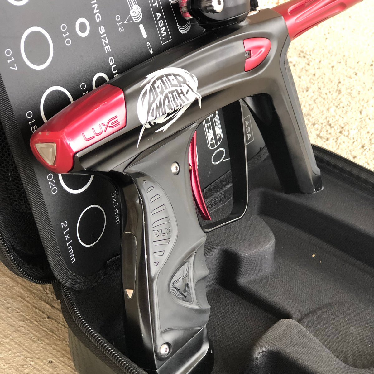 Used DLX Luxe Ice Paintball Gun - Black/Red w/ Aftermath Lazering