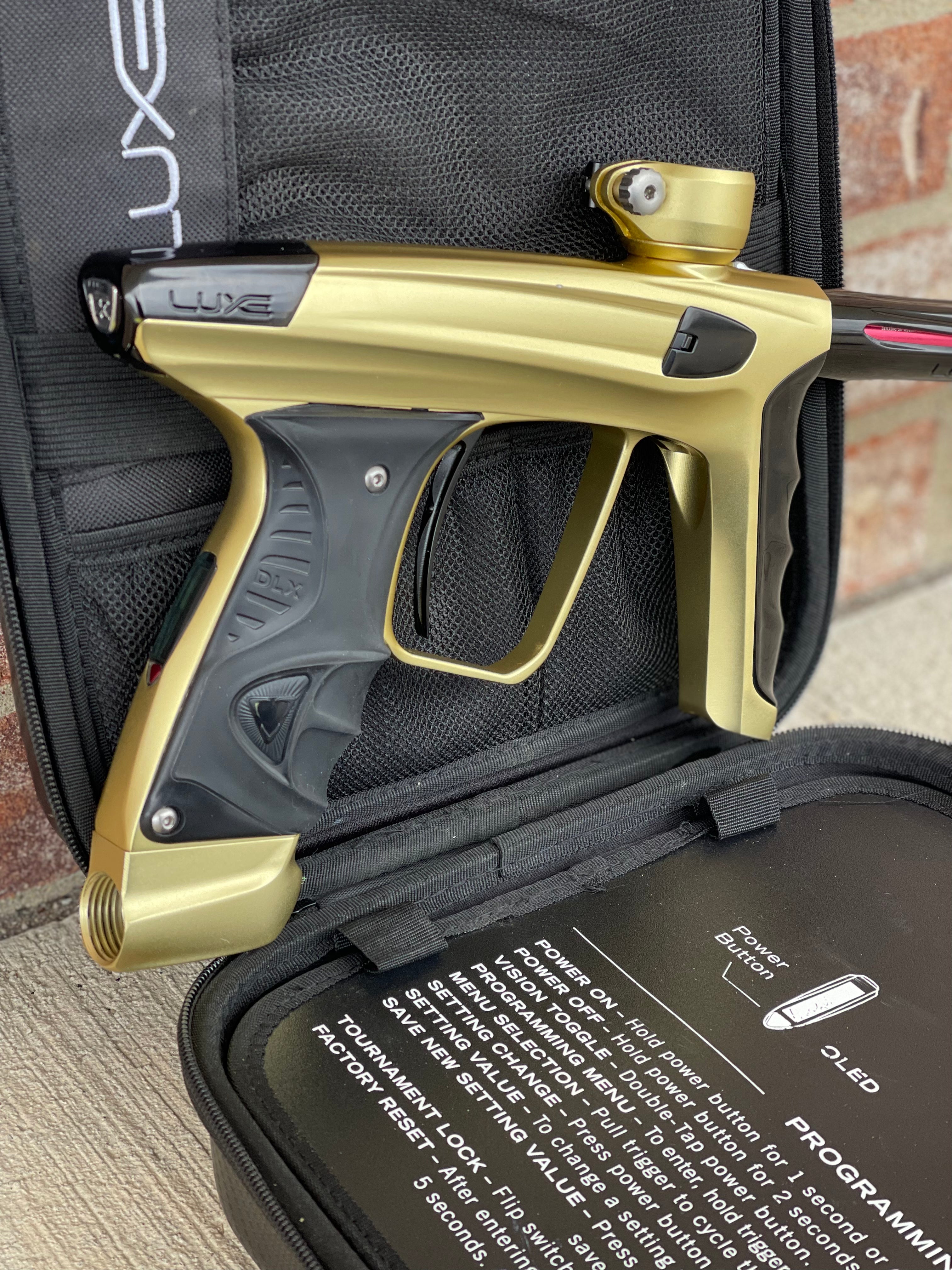 Used DLX Luxe X Paintball Gun - Dust Gold / Polished Black – Punishers Paintball